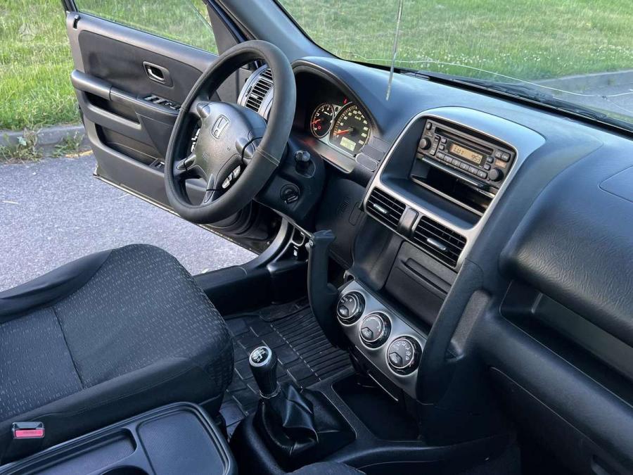 Black Honda CR-V 2006 in Vilnius, with an engine capacity of 2.20 L and mileage of 350 thousand km for 1850 €, photo 29 on AUTOMOTO.COM.LV