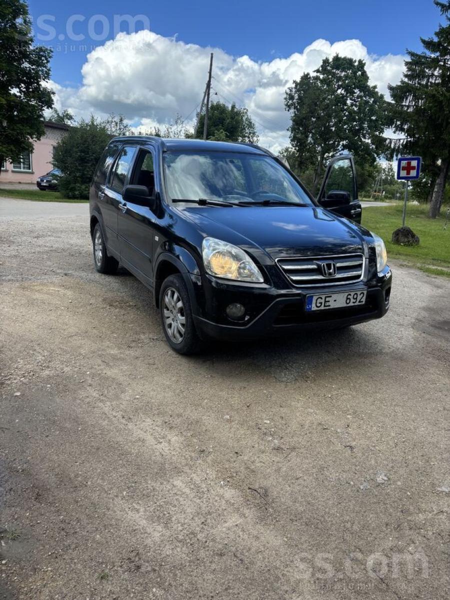 Melns Honda CR-V 2006 Rēzekne, ar dzinēja tilpumu 2.20 L un nobraukumu 245 tūkst. km par 1600 €, foto 1 vietnē AUTOMOTO.COM.LV
