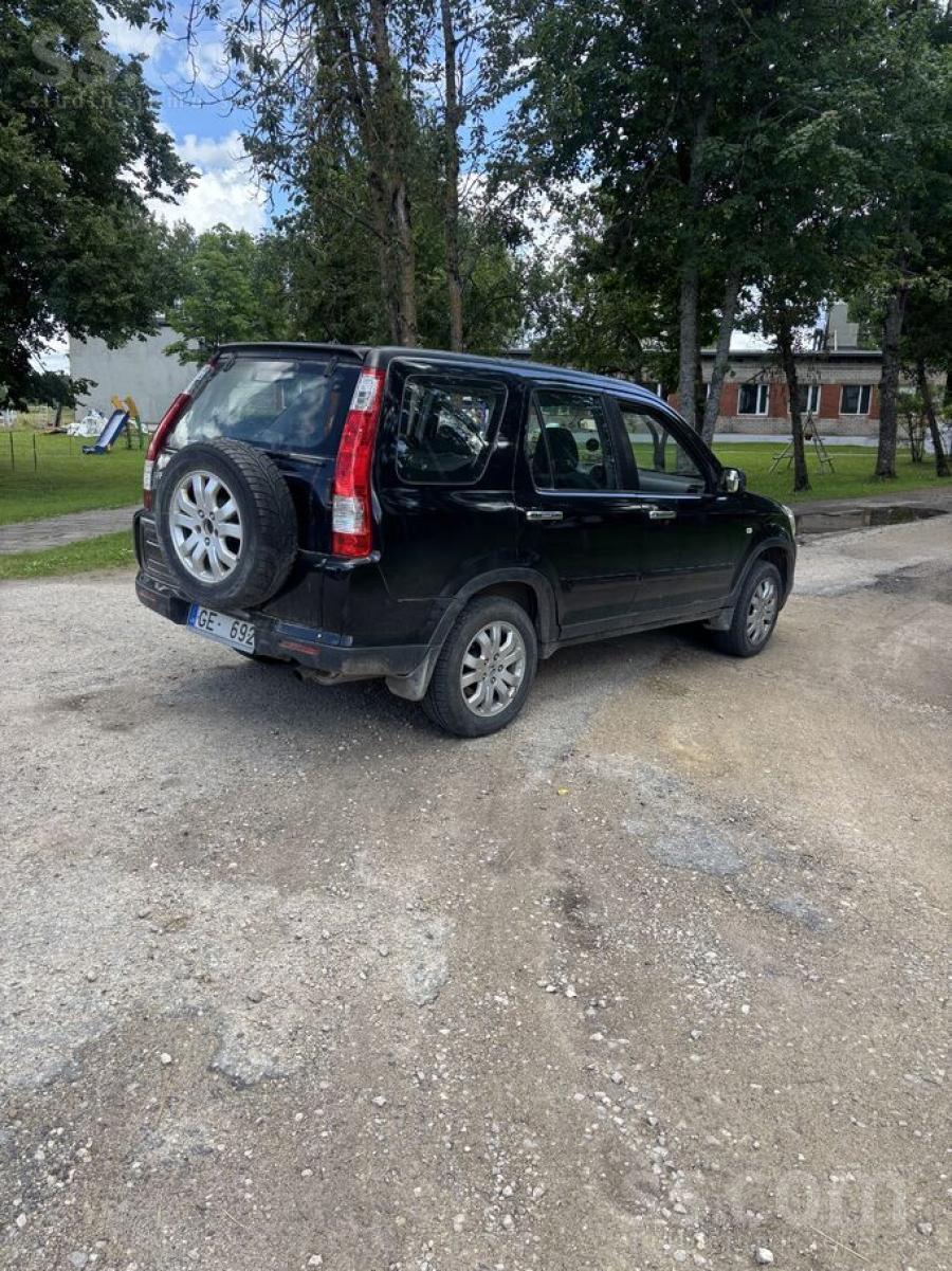 Melns Honda CR-V 2006 Rēzekne, ar dzinēja tilpumu 2.20 L un nobraukumu 245 tūkst. km par 1600 €, foto 3 vietnē AUTOMOTO.COM.LV