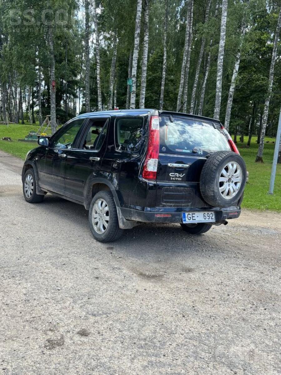 Melns Honda CR-V 2006 Rēzekne, ar dzinēja tilpumu 2.20 L un nobraukumu 245 tūkst. km par 1600 €, foto 6 vietnē AUTOMOTO.COM.LV