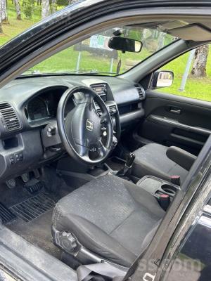 Melns Honda CR-V 2006 Rēzekne, ar dzinēja tilpumu 2.20 L un nobraukumu 245 tūkst. km par 1600 €, foto 8 vietnē AUTOMOTO.COM.LV