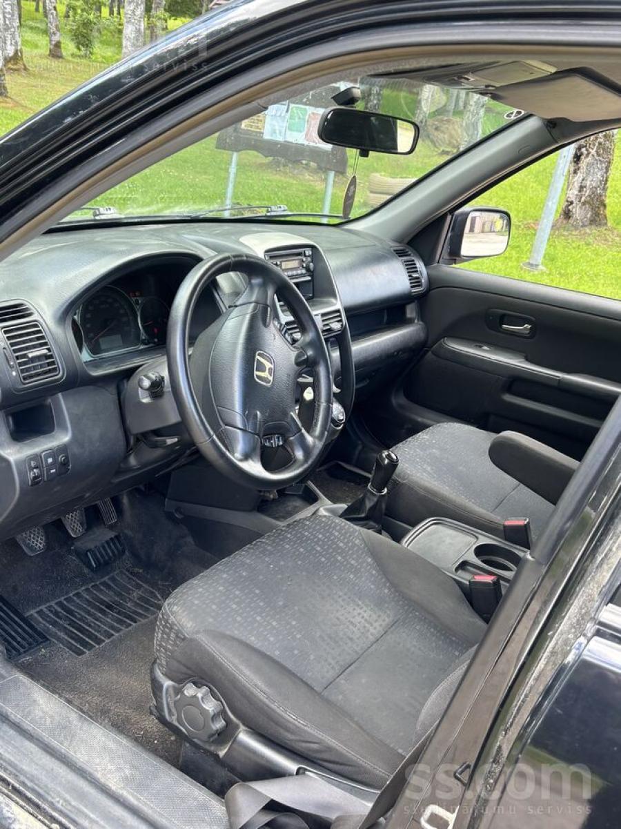 Melns Honda CR-V 2006 Rēzekne, ar dzinēja tilpumu 2.20 L un nobraukumu 245 tūkst. km par 1600 €, foto 8 vietnē AUTOMOTO.COM.LV
