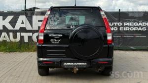 Black Honda CR-V 2006 in Liepaja, with an engine capacity of 2.20 L and mileage of 270 thousand km for 4150 €, photo 6 on AUTOMOTO.COM.LV