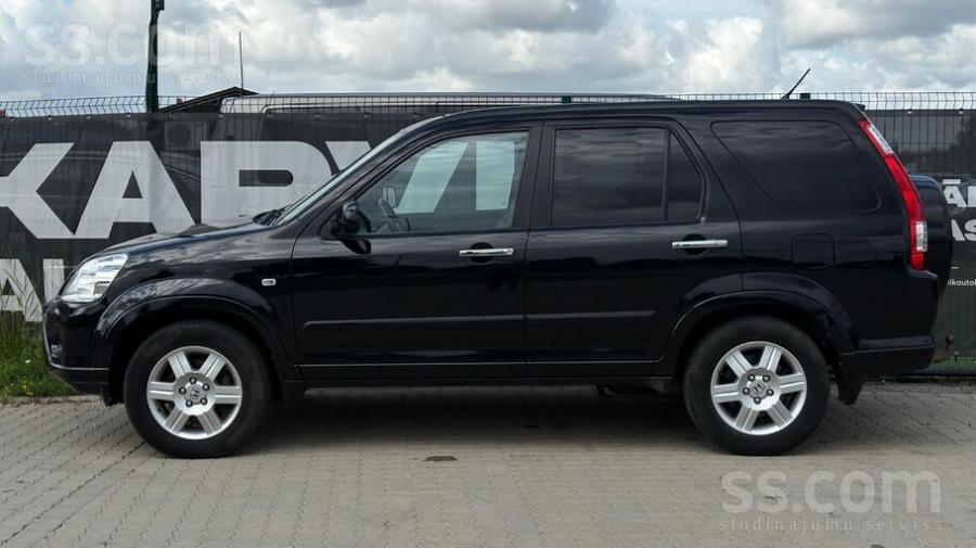 Black Honda CR-V 2006 in Liepaja, with an engine capacity of 2.20 L and mileage of 270 thousand km for 4150 €, photo 8 on AUTOMOTO.COM.LV
