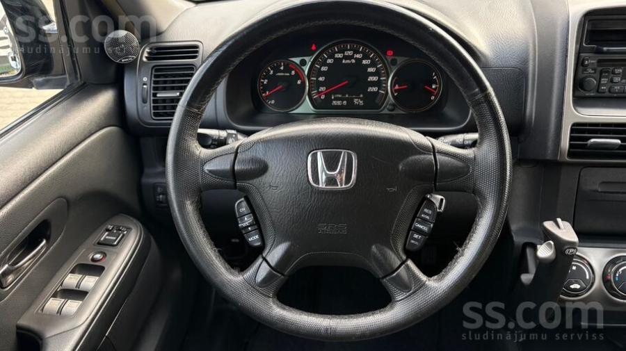Black Honda CR-V 2006 in Liepaja, with an engine capacity of 2.20 L and mileage of 270 thousand km for 4150 €, photo 14 on AUTOMOTO.COM.LV