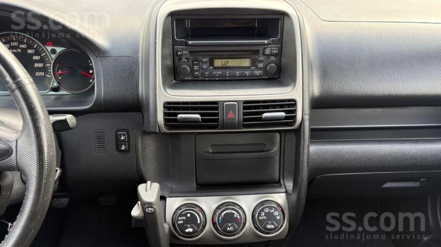 Black Honda CR-V 2006 in Liepaja, with an engine capacity of 2.20 L and mileage of 270 thousand km for 4150 €, photo 15 on AUTOMOTO.COM.LV