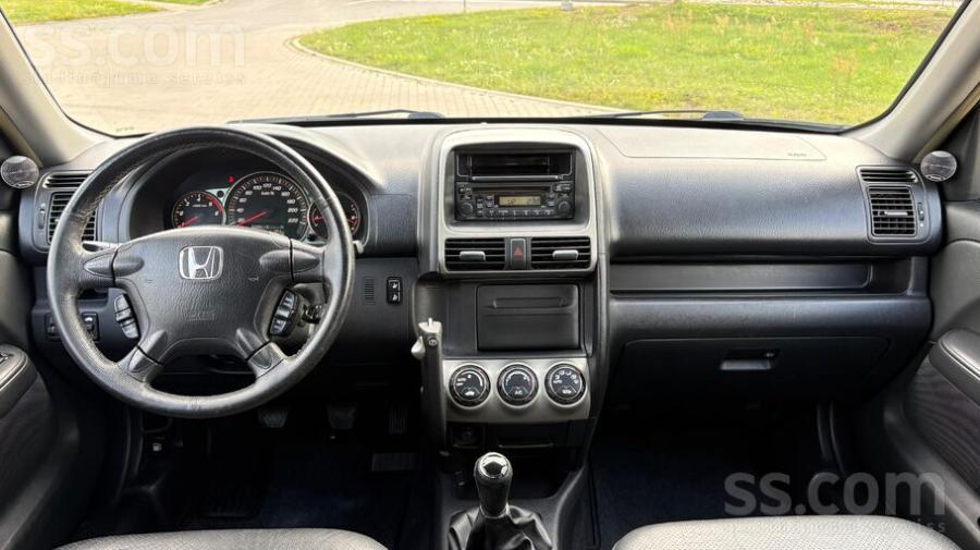Black Honda CR-V 2006 in Liepaja, with an engine capacity of 2.20 L and mileage of 270 thousand km for 4150 €, photo 16 on AUTOMOTO.COM.LV