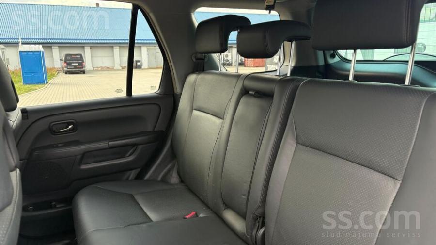 Black Honda CR-V 2006 in Liepaja, with an engine capacity of 2.20 L and mileage of 270 thousand km for 4150 €, photo 23 on AUTOMOTO.COM.LV