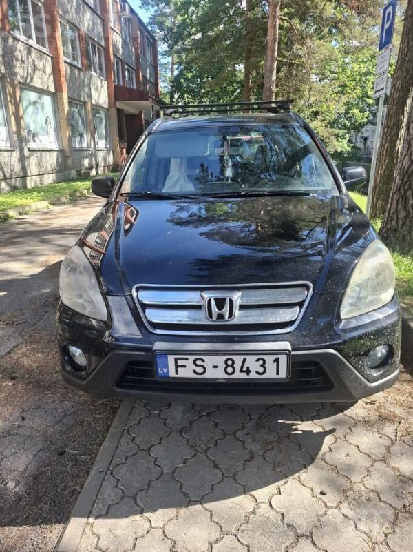 Melns Honda CR-V 2006 Rīga, ar dzinēja tilpumu 2.00 L un nobraukumu 274 tūkst. km par 1400 €, foto 4 vietnē AUTOMOTO.COM.LV