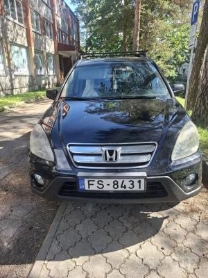 Black Honda CR-V 2006 in Riga, with an engine capacity of 2.00 L and mileage of 274 thousand km for 1400 €, photo 5 on AUTOMOTO.COM.LV