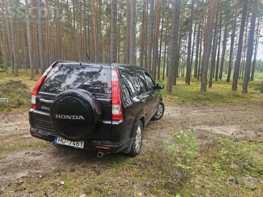 Melns Honda CR-V 2006 Rīga, ar dzinēja tilpumu 2.00 L un nobraukumu 282 tūkst. km par 1250 €, foto 5 vietnē AUTOMOTO.COM.LV