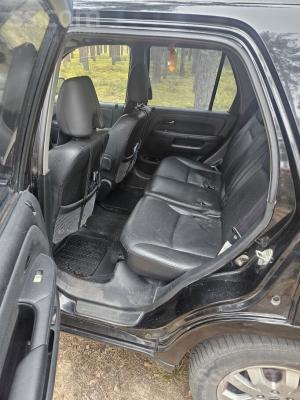 Melns Honda CR-V 2006 Rīga, ar dzinēja tilpumu 2.00 L un nobraukumu 282 tūkst. km par 1250 €, foto 7 vietnē AUTOMOTO.COM.LV