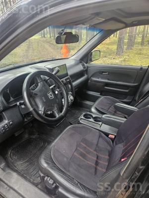 Melns Honda CR-V 2006 Rīga, ar dzinēja tilpumu 2.00 L un nobraukumu 282 tūkst. km par 1250 €, foto 8 vietnē AUTOMOTO.COM.LV