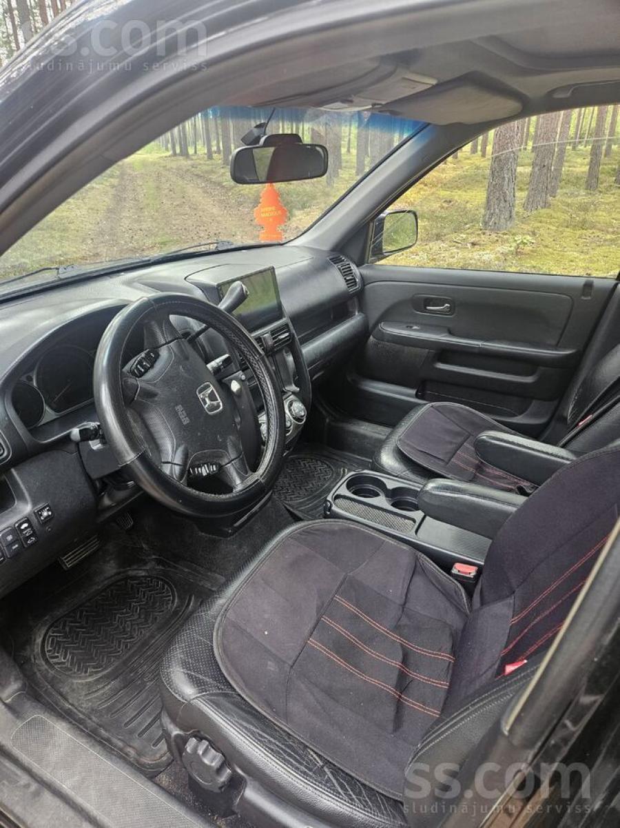 Melns Honda CR-V 2006 Rīga, ar dzinēja tilpumu 2.00 L un nobraukumu 282 tūkst. km par 1250 €, foto 8 vietnē AUTOMOTO.COM.LV