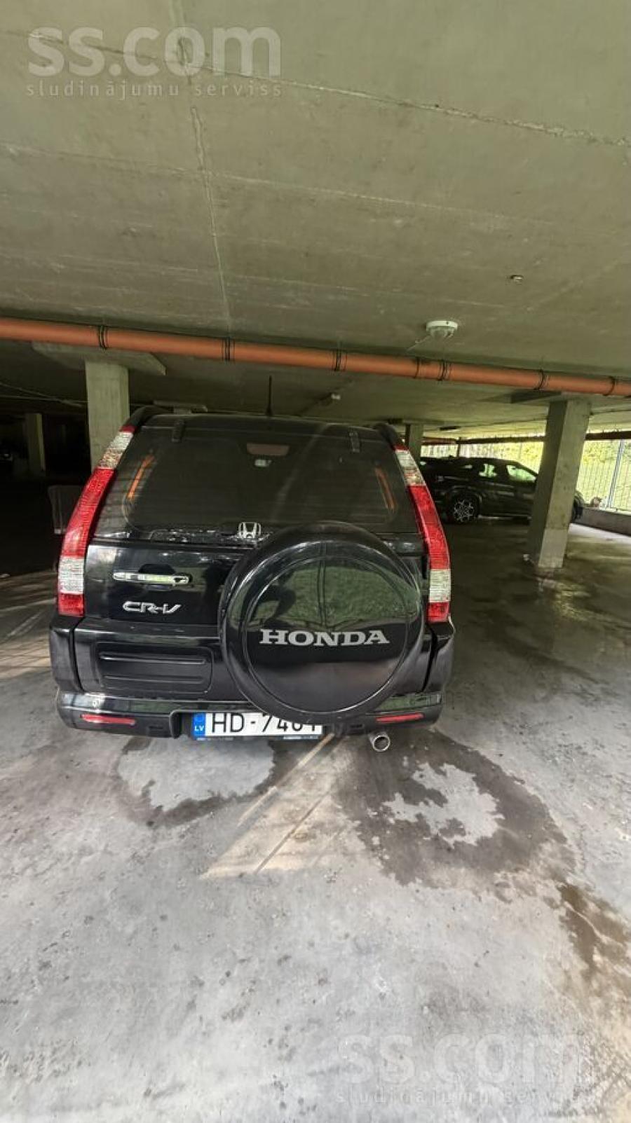 Black Honda CR-V 2006 in Riga, with an engine capacity of 2.00 L and mileage of 280 thousand km for 2650 €, photo 6 on AUTOMOTO.COM.LV