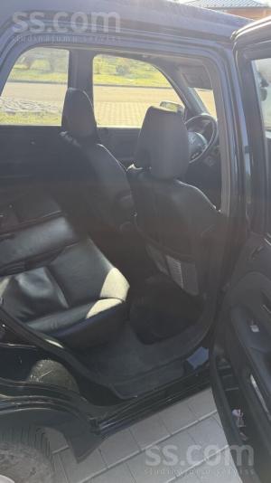 Black Honda CR-V 2006 in Riga, with an engine capacity of 2.00 L and mileage of 280 thousand km for 2650 €, photo 10 on AUTOMOTO.COM.LV