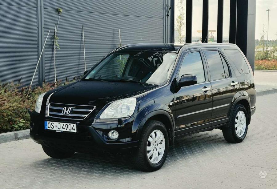Black Honda CR-V 2006 in Vilnius, with an engine capacity of 2.20 L and mileage of 248 thousand km for 4850 €, photo 3 on AUTOMOTO.COM.LV