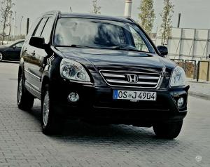 Black Honda CR-V 2006 in Vilnius, with an engine capacity of 2.20 L and mileage of 248 thousand km for 4850 €, photo 4 on AUTOMOTO.COM.LV