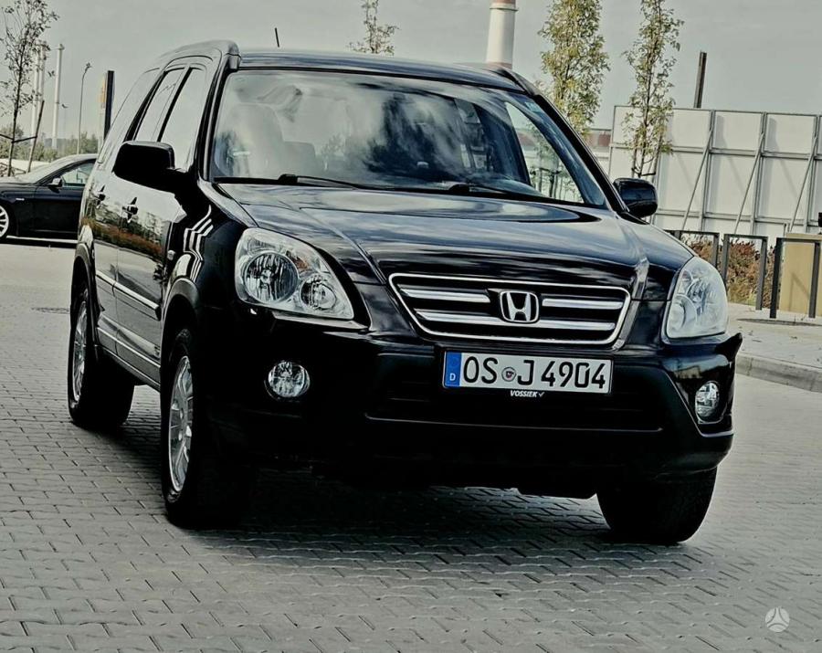 Black Honda CR-V 2006 in Vilnius, with an engine capacity of 2.20 L and mileage of 248 thousand km for 4850 €, photo 4 on AUTOMOTO.COM.LV