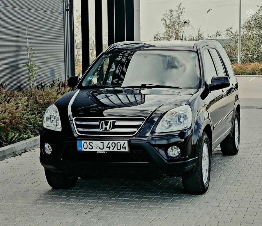 Black Honda CR-V 2006 in Vilnius, with an engine capacity of 2.20 L and mileage of 248 thousand km for 4850 €, photo 7 on AUTOMOTO.COM.LV