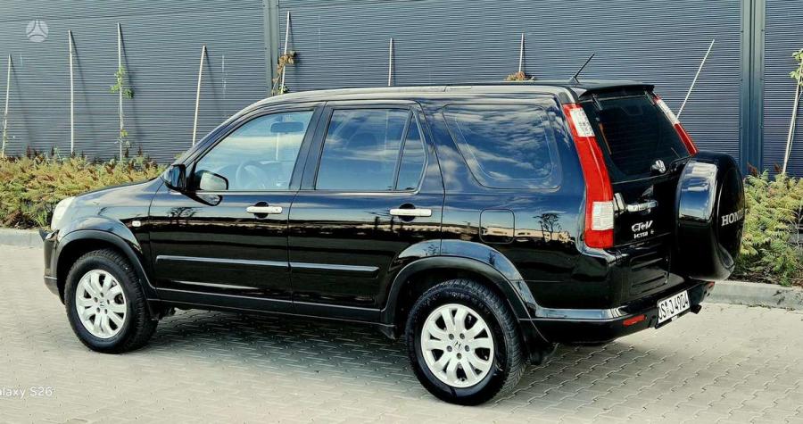 Black Honda CR-V 2006 in Vilnius, with an engine capacity of 2.20 L and mileage of 248 thousand km for 4850 €, photo 9 on AUTOMOTO.COM.LV