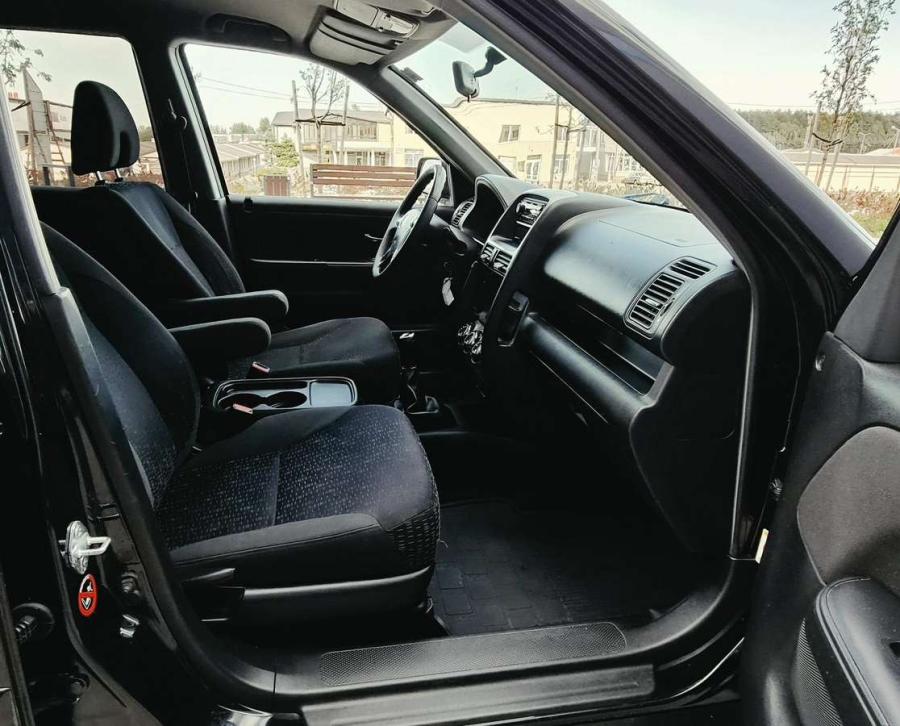 Black Honda CR-V 2006 in Vilnius, with an engine capacity of 2.20 L and mileage of 248 thousand km for 4850 €, photo 14 on AUTOMOTO.COM.LV