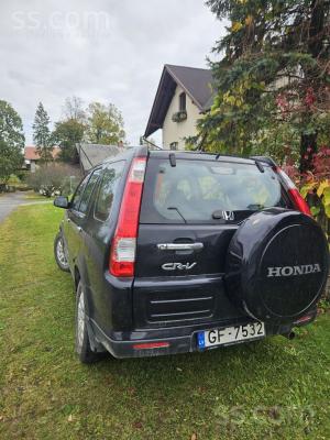Melns Honda CR-V 2006 Rīga, ar dzinēja tilpumu 2.00 L un nobraukumu 98 tūkst. km par 2000 €, foto 5 vietnē AUTOMOTO.COM.LV