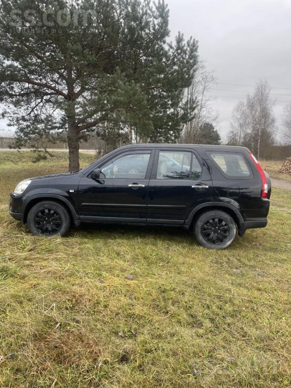 Melns Honda CR-V 2007 Jelgava, ar dzinēja tilpumu 2.00 L un nobraukumu 347 tūkst. km par 1200 €, foto 2 vietnē AUTOMOTO.COM.LV