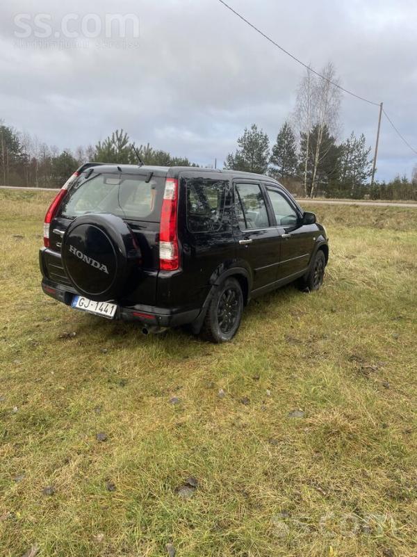 Melns Honda CR-V 2007 Jelgava, ar dzinēja tilpumu 2.00 L un nobraukumu 347 tūkst. km par 1200 €, foto 3 vietnē AUTOMOTO.COM.LV
