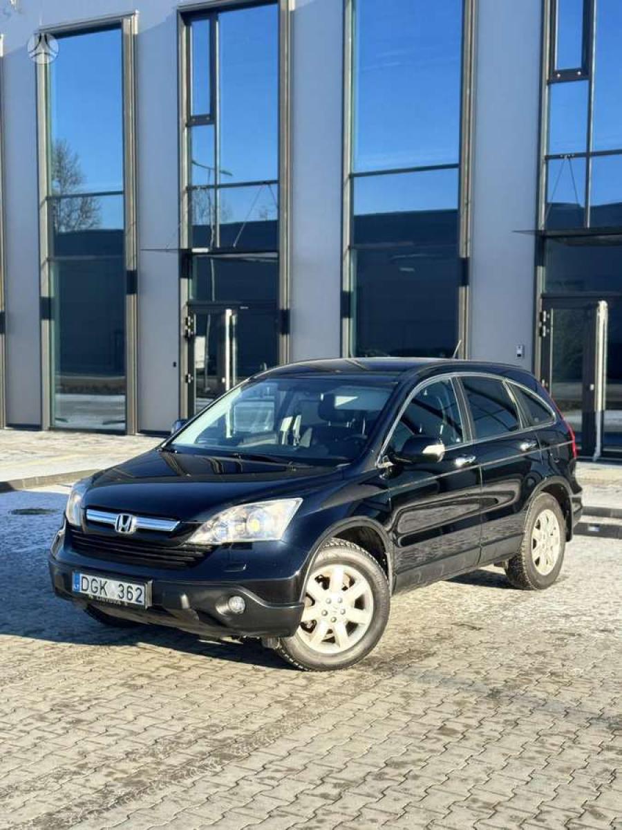 Black Honda CR-V 2007 in Vilnius, with an engine capacity of 2.00 L and mileage of 225 thousand km for 4950 €, photo 1 on AUTOMOTO.COM.LV