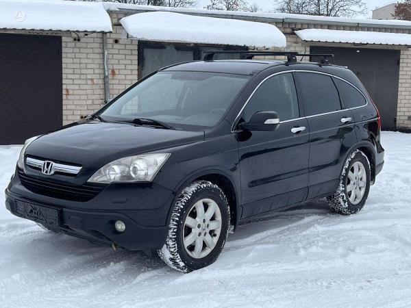 Black Honda CR-V 2007 in Jonava, with an engine capacity of 2.20 L and mileage of 309 thousand km for 4400 €, photo 1 on AUTOMOTO.COM.LV