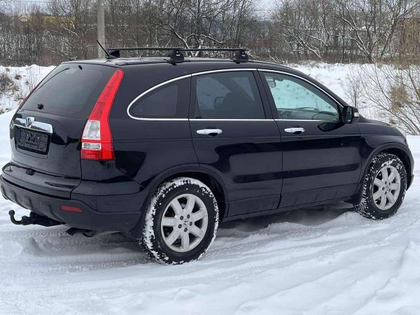 Black Honda CR-V 2007 in Jonava, with an engine capacity of 2.20 L and mileage of 309 thousand km for 4400 €, photo 7 on AUTOMOTO.COM.LV