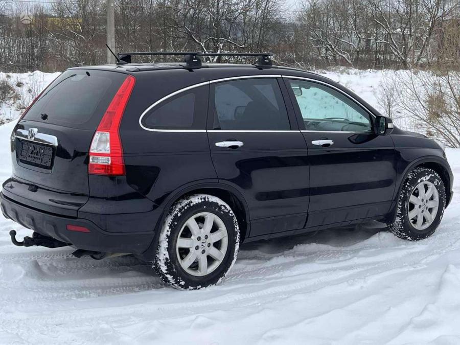 Black Honda CR-V 2007 in Jonava, with an engine capacity of 2.20 L and mileage of 309 thousand km for 4400 €, photo 7 on AUTOMOTO.COM.LV