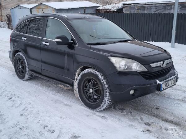 Melns Honda CR-V 2007 Radviliškis, ar dzinēja tilpumu 2.20 L un nobraukumu 260 tūkst. km par 3100 €, foto 3 vietnē AUTOMOTO.COM.LV