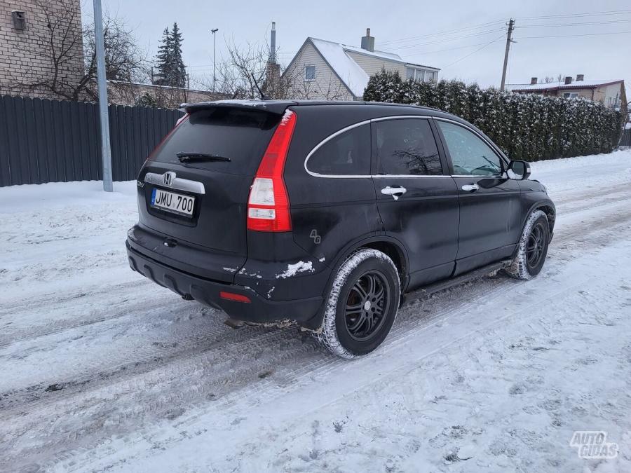 Black Honda CR-V 2007 in Radviliskis, with an engine capacity of 2.20 L and mileage of 260 thousand km for 3100 €, photo 4 on AUTOMOTO.COM.LV