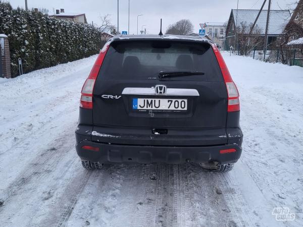 Melns Honda CR-V 2007 Radviliškis, ar dzinēja tilpumu 2.20 L un nobraukumu 260 tūkst. km par 3100 €, foto 5 vietnē AUTOMOTO.COM.LV