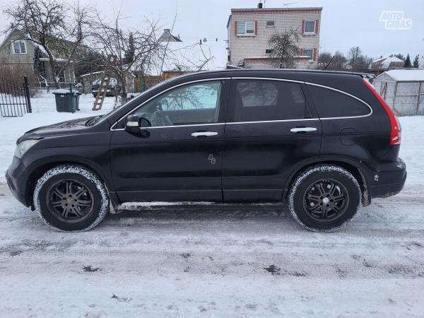 Melns Honda CR-V 2007 Radviliškis, ar dzinēja tilpumu 2.20 L un nobraukumu 260 tūkst. km par 3100 €, foto 7 vietnē AUTOMOTO.COM.LV