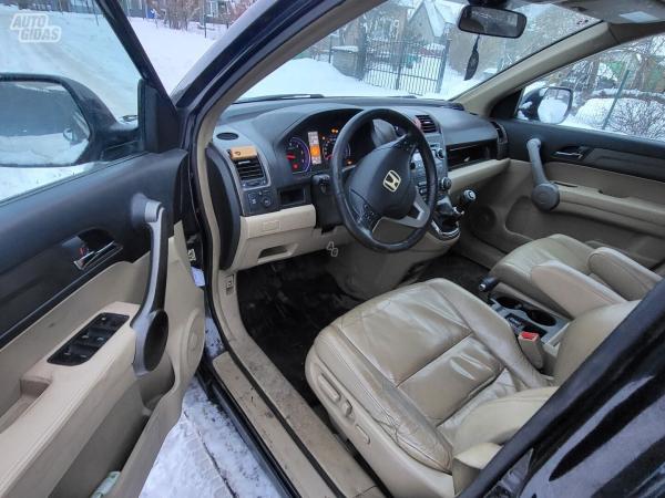 Melns Honda CR-V 2007 Radviliškis, ar dzinēja tilpumu 2.20 L un nobraukumu 260 tūkst. km par 3100 €, foto 9 vietnē AUTOMOTO.COM.LV