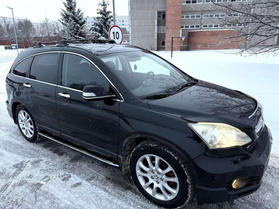 Black Honda CR-V 2007 in Kaunas, with an engine capacity of 2.00 L and mileage of 278 thousand km for 5750 €, photo 29 on AUTOMOTO.COM.LV