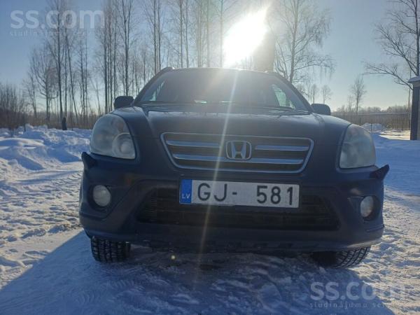 Melns Honda CR-V 2007 Daugavpils, ar dzinēja tilpumu 2.20 L un nobraukumu 371 tūkst. km par 1700 €, foto 2 vietnē AUTOMOTO.COM.LV