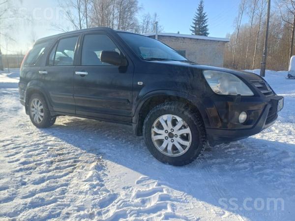 Melns Honda CR-V 2007 Daugavpils, ar dzinēja tilpumu 2.20 L un nobraukumu 371 tūkst. km par 1700 €, foto 3 vietnē AUTOMOTO.COM.LV