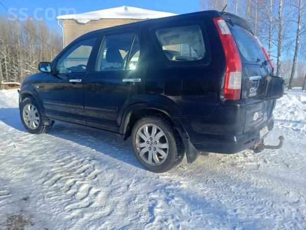 Melns Honda CR-V 2007 Daugavpils, ar dzinēja tilpumu 2.20 L un nobraukumu 371 tūkst. km par 1700 €, foto 4 vietnē AUTOMOTO.COM.LV