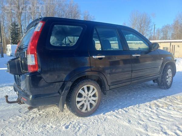 Melns Honda CR-V 2007 Daugavpils, ar dzinēja tilpumu 2.20 L un nobraukumu 371 tūkst. km par 1700 €, foto 5 vietnē AUTOMOTO.COM.LV