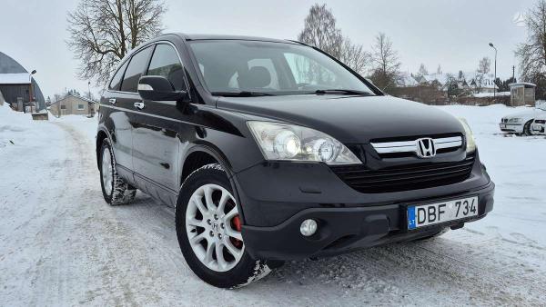 Black Honda CR-V 2007 in Utena, with an engine capacity of 2.20 L and mileage of 400 thousand km for 3890 €, photo 2 on AUTOMOTO.COM.LV