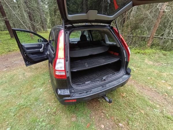 Melns Honda CR-V 2007 Ignalina, ar dzinēja tilpumu 2.20 L un nobraukumu 355 tūkst. km par 3100 €, foto 6 vietnē AUTOMOTO.COM.LV