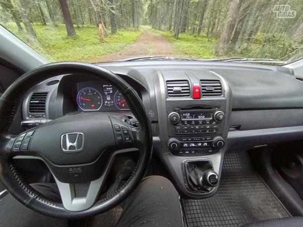 Melns Honda CR-V 2007 Ignalina, ar dzinēja tilpumu 2.20 L un nobraukumu 355 tūkst. km par 3100 €, foto 7 vietnē AUTOMOTO.COM.LV