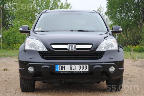 Black Honda CR-V 2007 in Riga, with an engine capacity of 2.20 L and mileage of 225 thousand km for 6990 €, photo 5 on AUTOMOTO.COM.LV