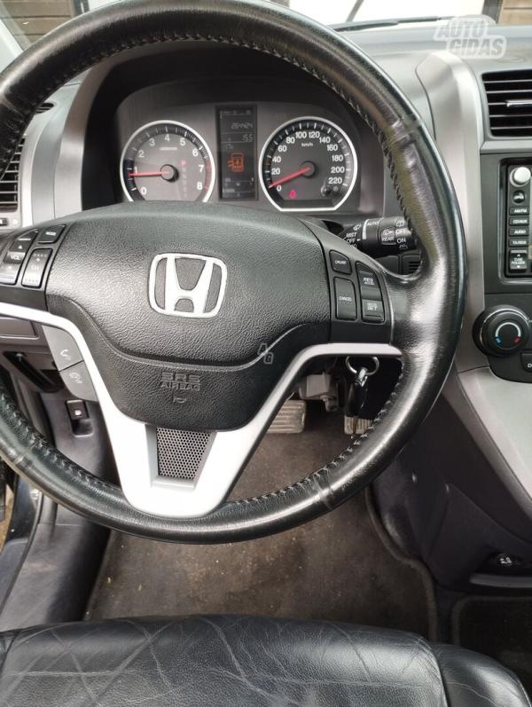 Melns Honda CR-V 2007 Telšiai, ar dzinēja tilpumu 2.00 L un nobraukumu 260 tūkst. km par 2600 €, foto 5 vietnē AUTOMOTO.COM.LV