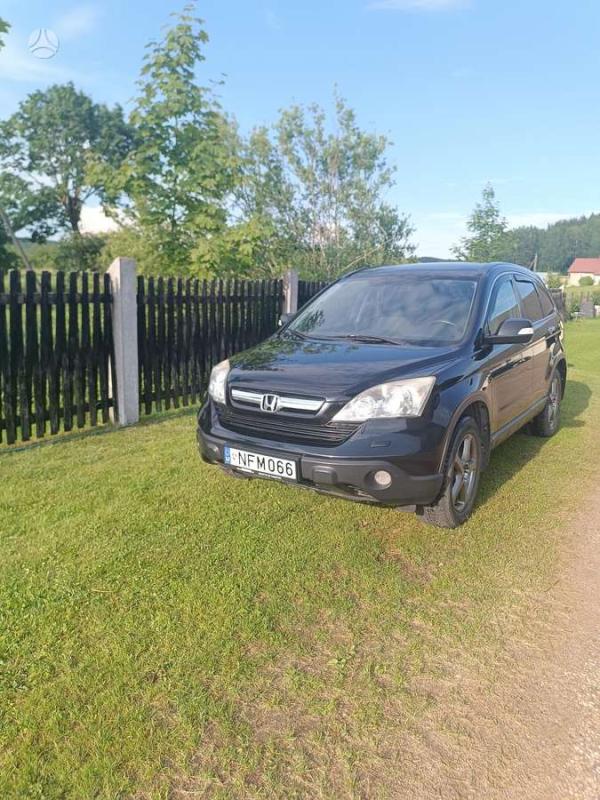Black Honda CR-V 2007 in Ignalina, with an engine capacity of 2.20 L and mileage of 315 thousand km for 3450 €, photo 7 on AUTOMOTO.COM.LV