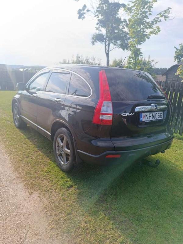 Black Honda CR-V 2007 in Ignalina, with an engine capacity of 2.20 L and mileage of 315 thousand km for 3450 €, photo 9 on AUTOMOTO.COM.LV